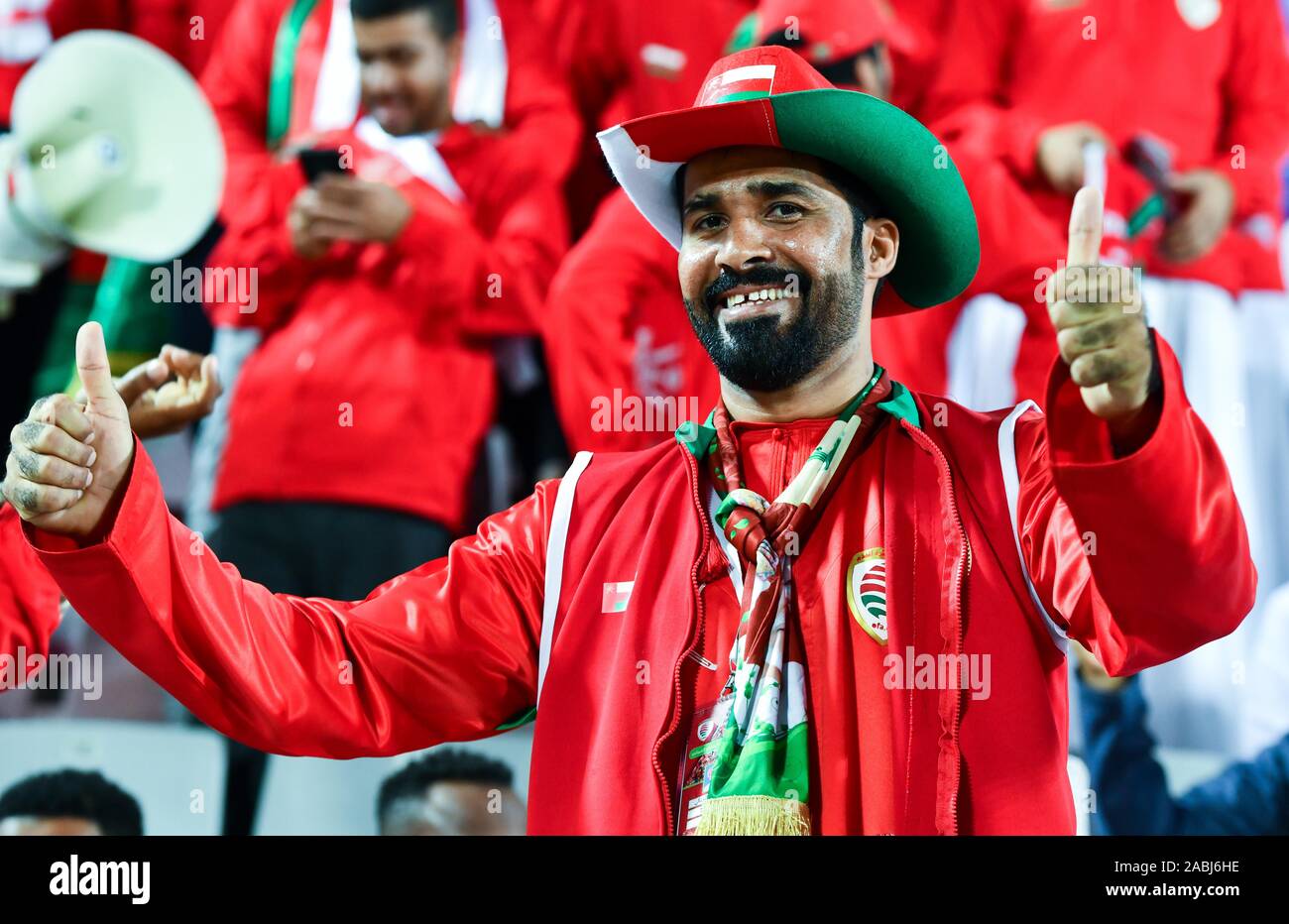 Doha, Qatar. 27th Nov, 2019. An Omani fan cheers for the team during ...