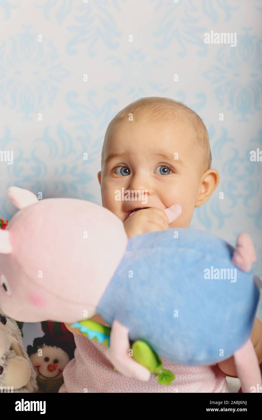 Portrait of adorable baby girl. Childhood. Authentic image Stock Photo ...