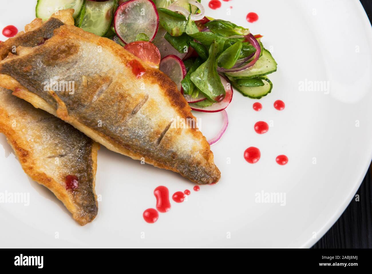Fillet of zander with vegetables Stock Photo - Alamy