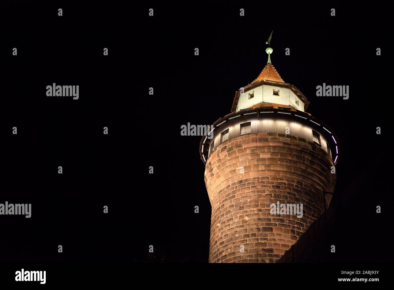 Tower of Nuremberg old town in the night Stock Photo - Alamy