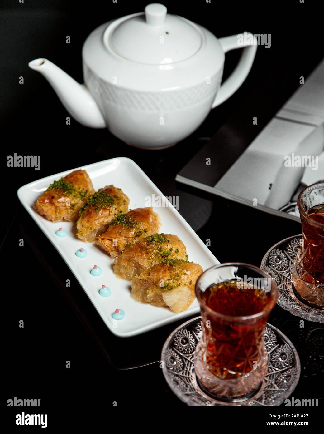 black tea in armudu with turkish pakhlava Stock Photo - Alamy