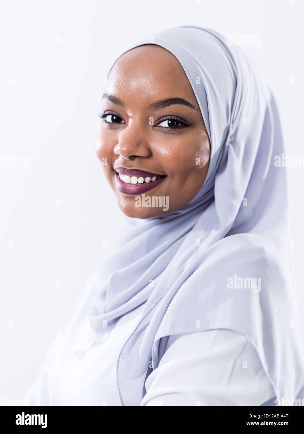 portrait of young modern muslim afro beauty wearing traditional islamic ...