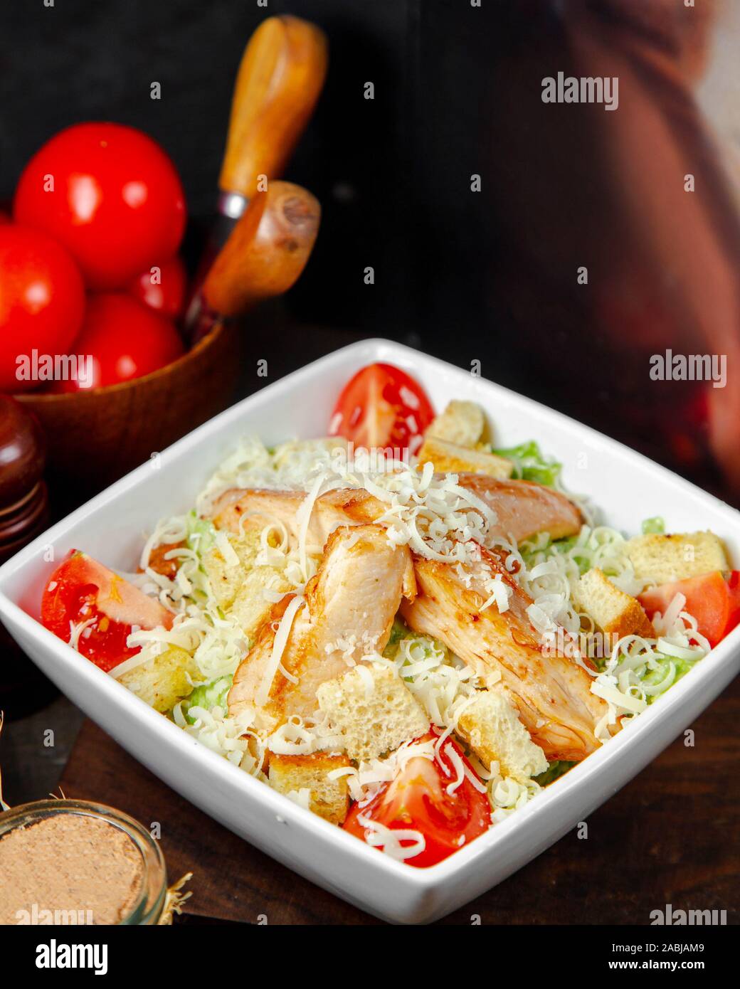 chicken caesar salad in the plate Stock Photo - Alamy