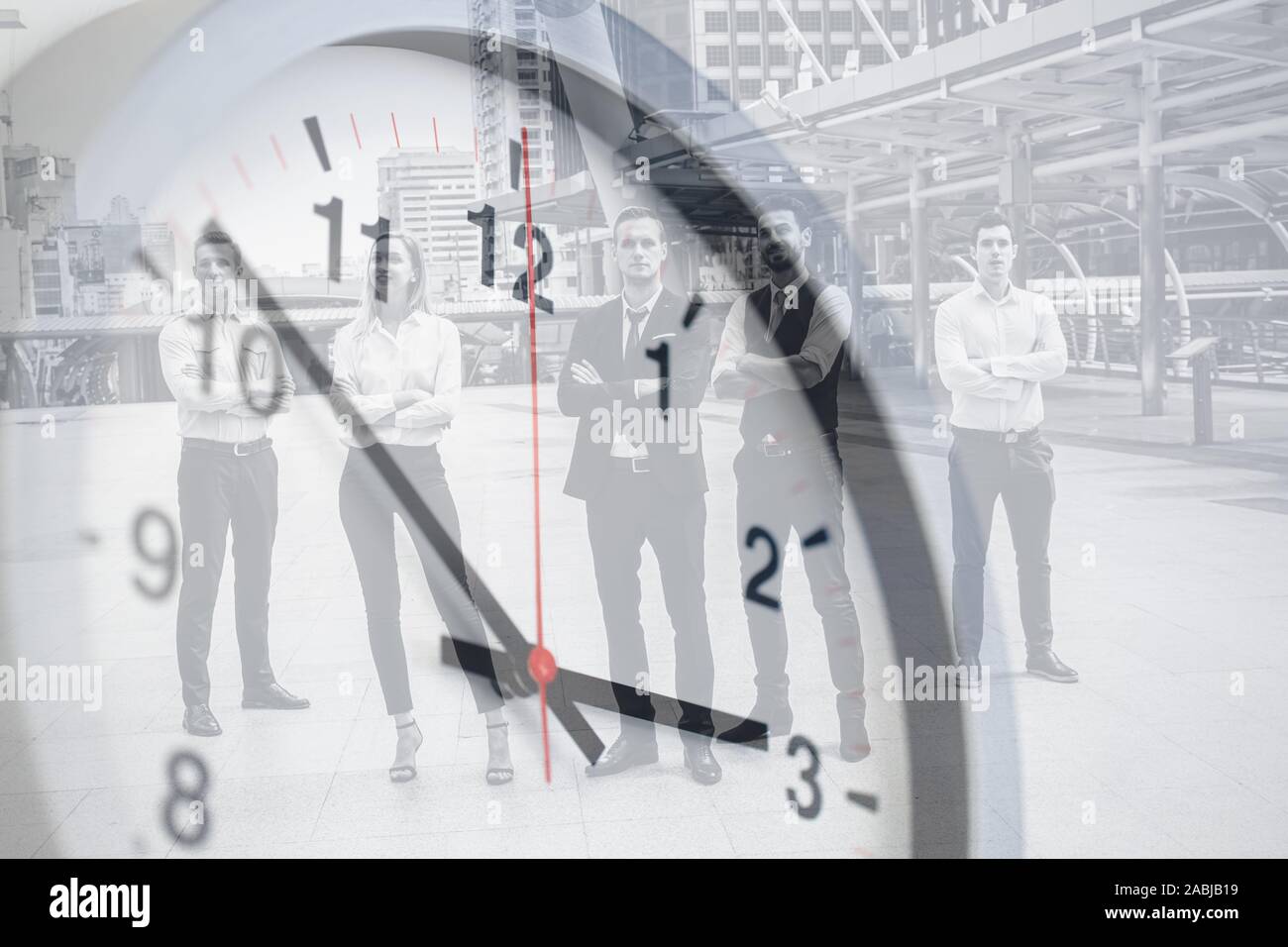 Business time clock face overlay with group of successful business ...
