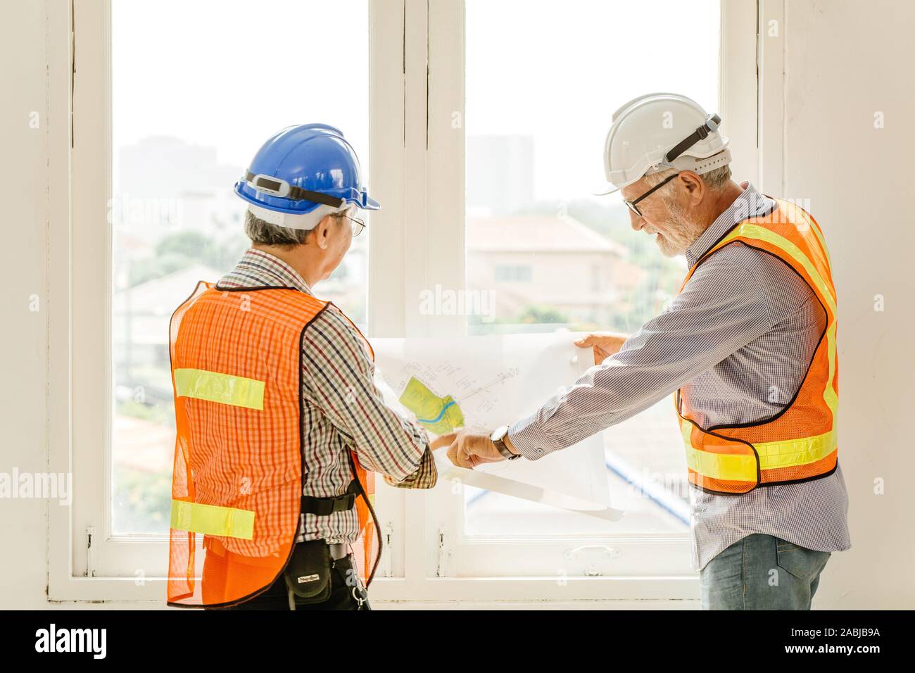 Happy professional worker working together home builder architecture ...