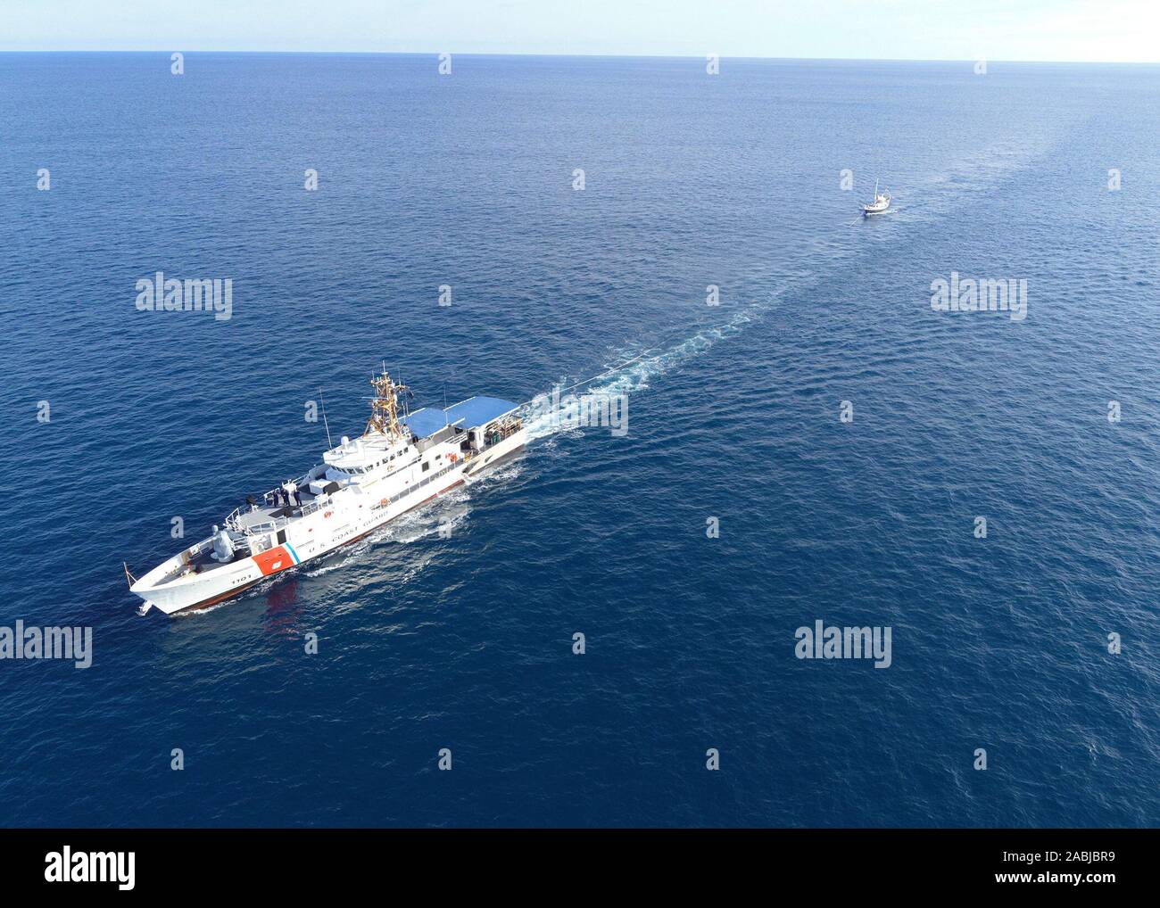 The Coast Guard Cutter Bernard C. Webber (WPC-1101) has the disabled 68 ...
