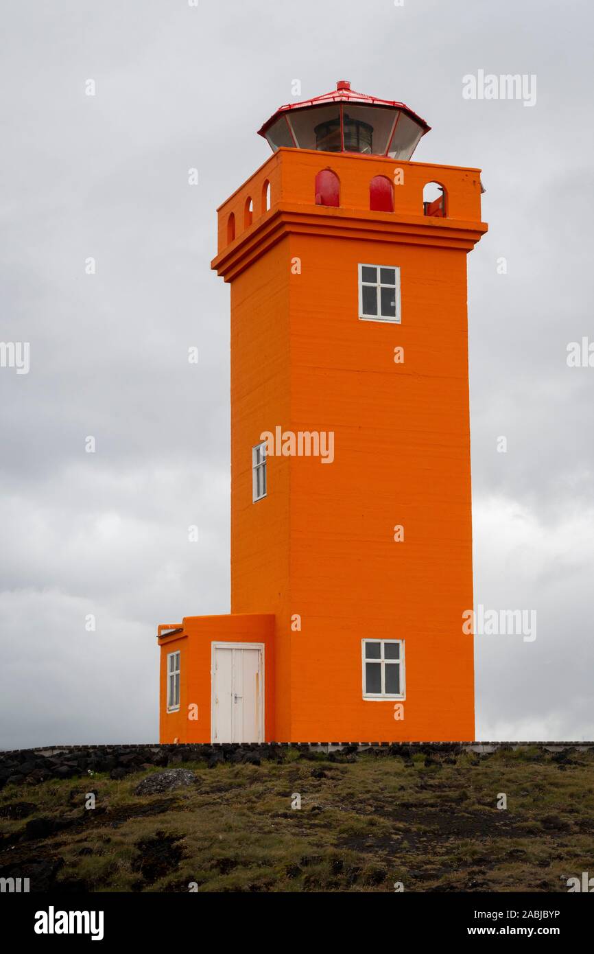 Orange lighthouse at Svörtuloft, Iceland Stock Photo - Alamy