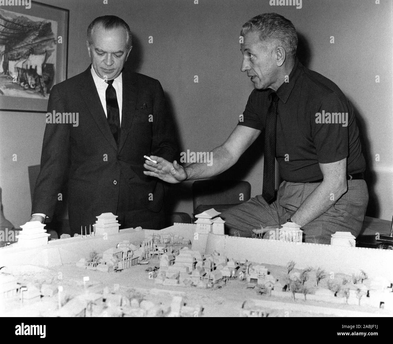 Producer SAMUEL BRONSTON and Director NICHOLAS RAY with model of Peking ...