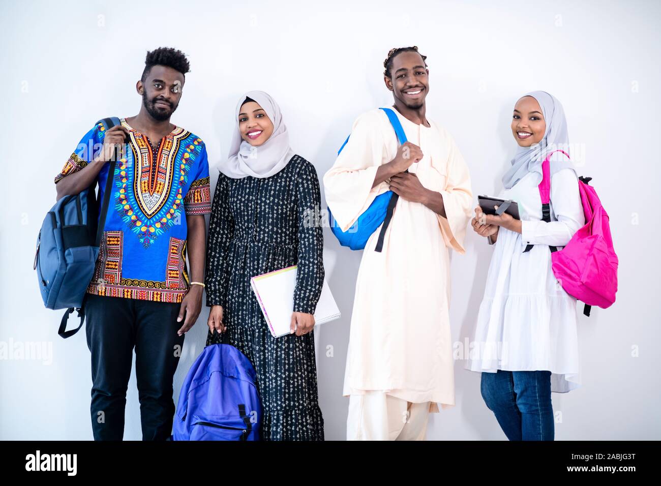 group portrait of happy african students standing together against ...