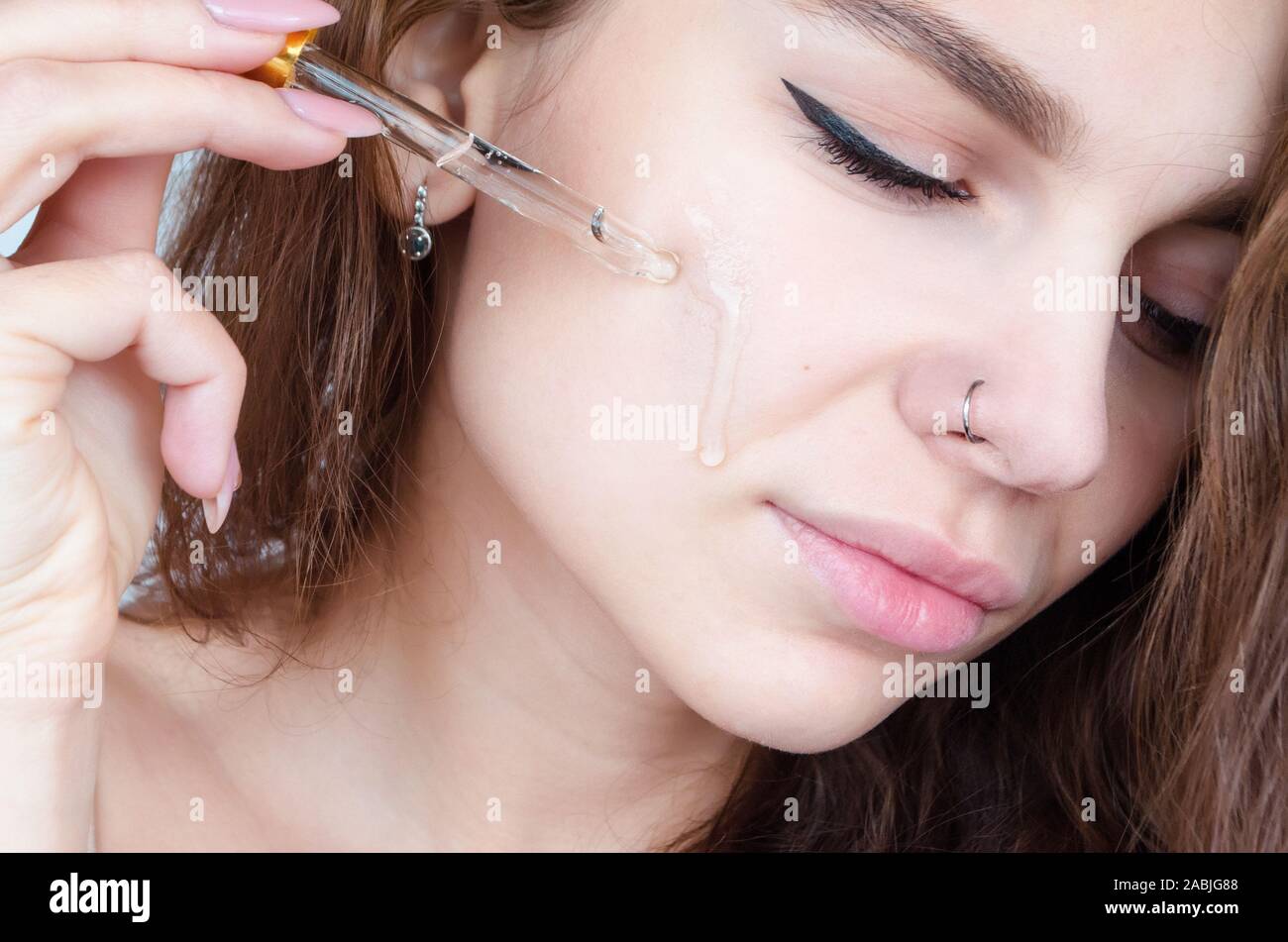 Woman serum face hi-res stock photography and images - Alamy