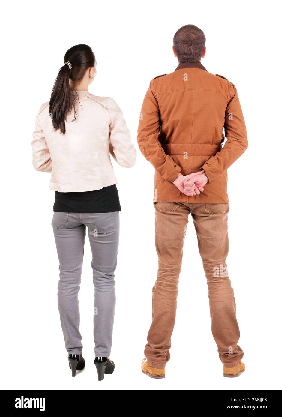 Back view of couple. beautiful friendly girl and guy together. Rear ...
