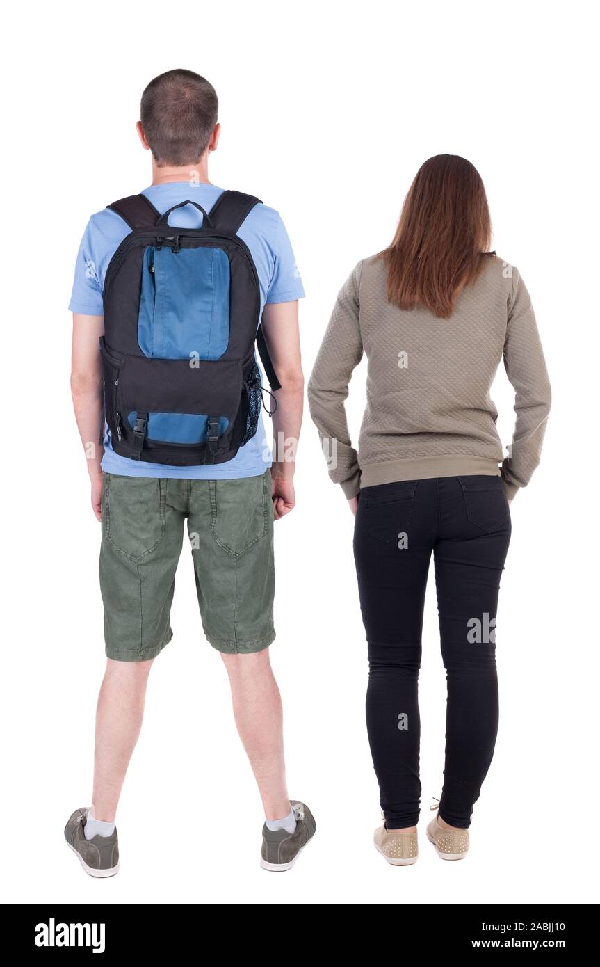 Back view of couple. beautiful friendly girl and guy together. Rear ...