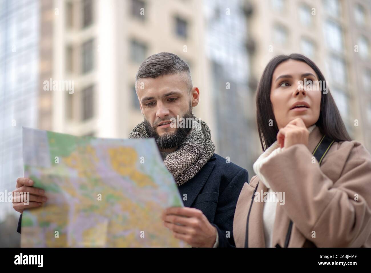 Thoughtful young people trying to find their way Stock Photo - Alamy