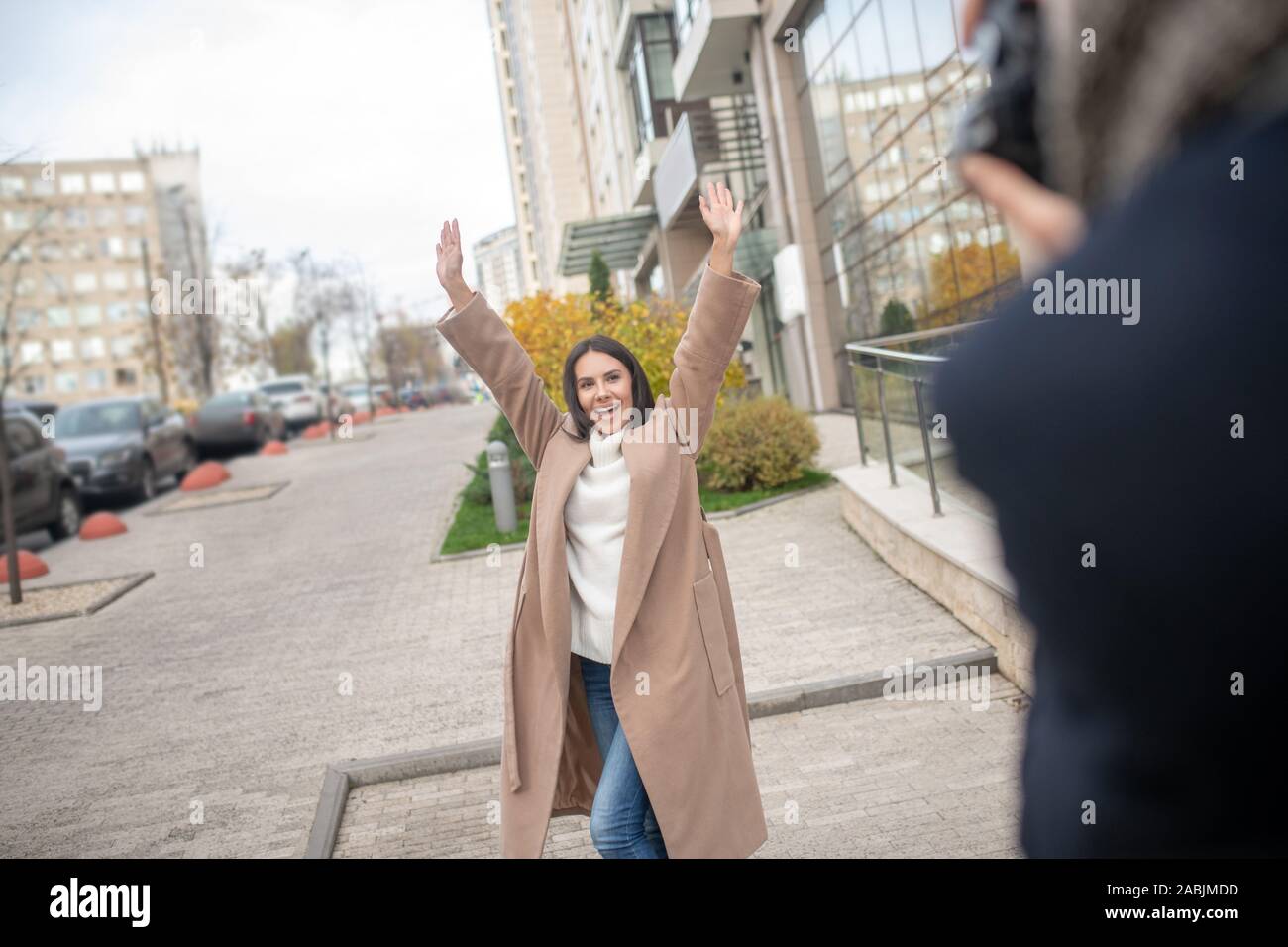 Woman pose photo holding hi-res stock photography and images - Alamy