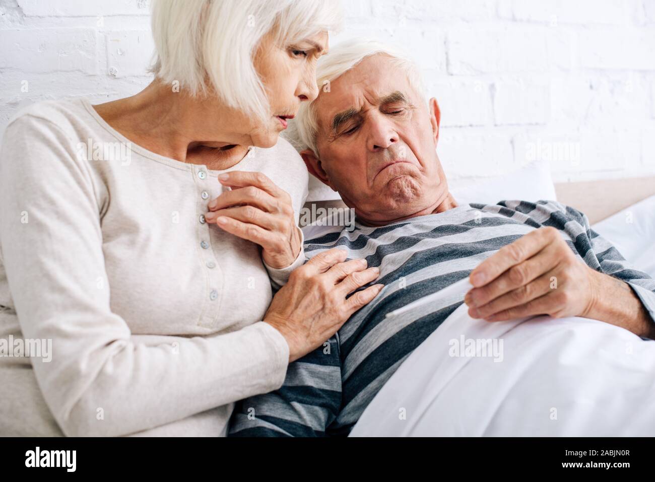 Sad husband with wife hi-res stock photography and images - Alamy
