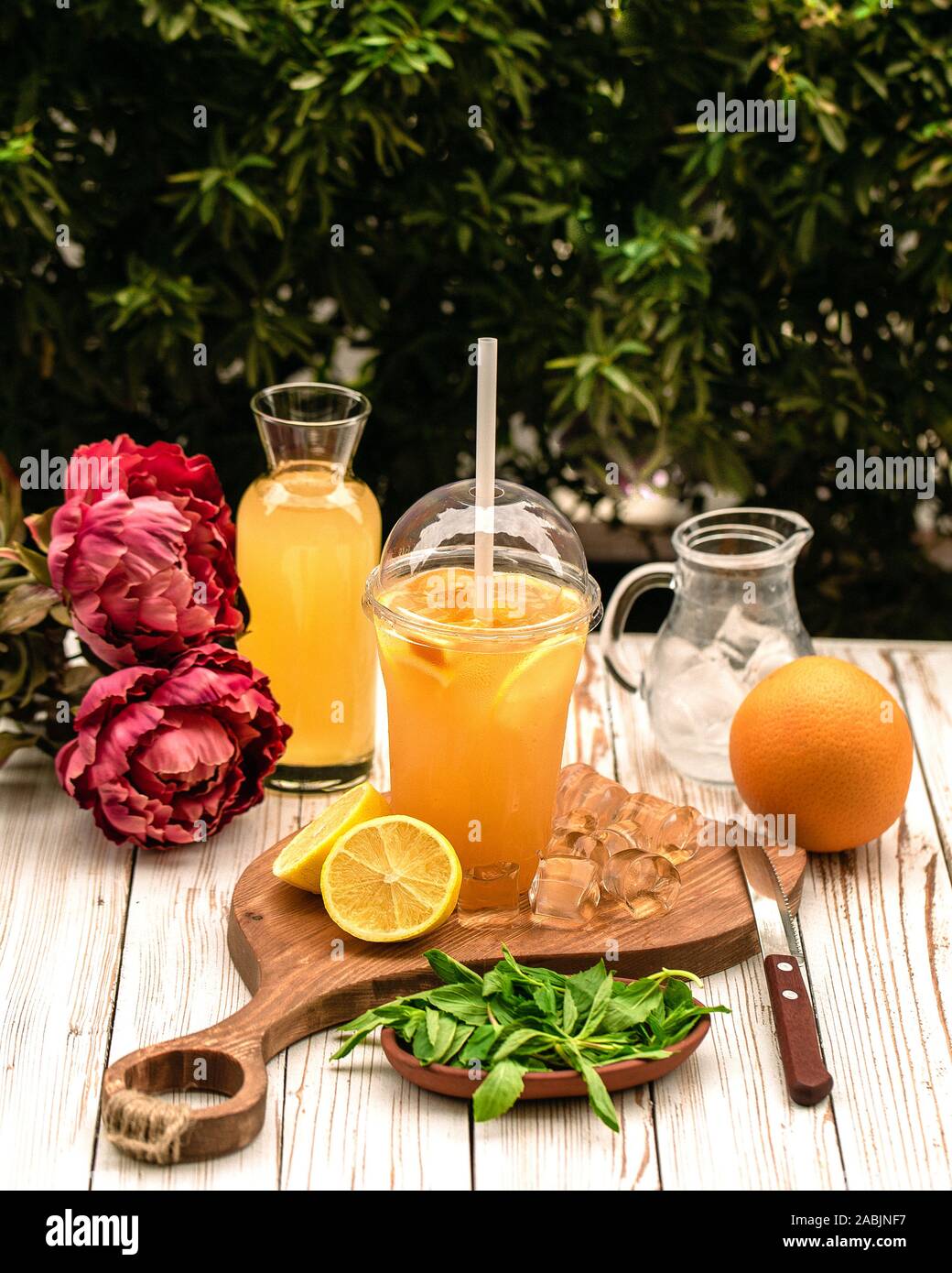 homemade ice tea filled with lemon slices Stock Photo - Alamy