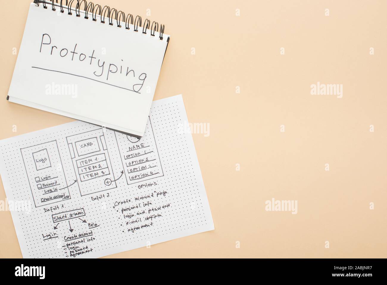top view of website design template and notebook with prototyping ...