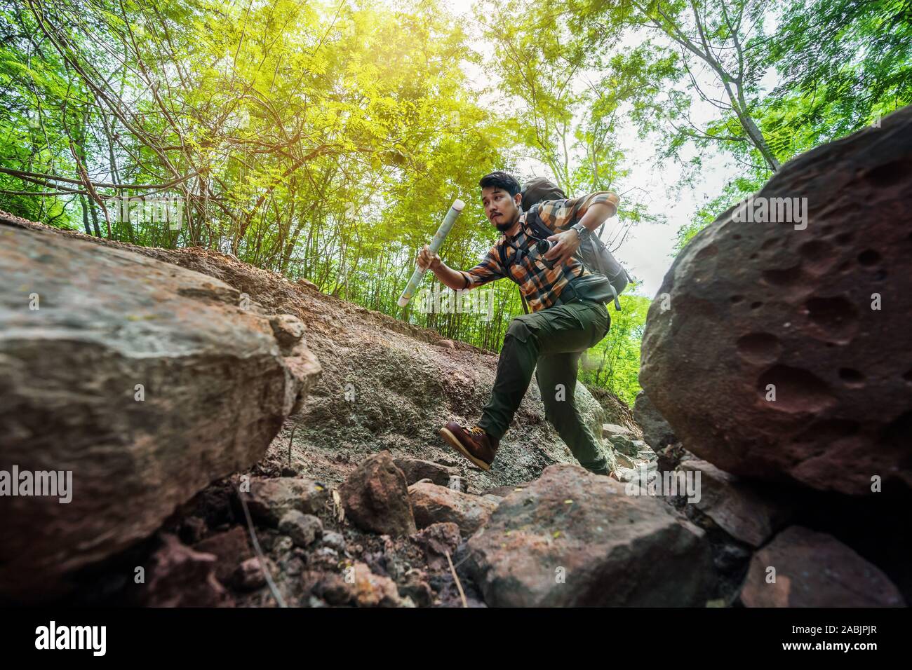 Man running backpack trail hi-res stock photography and images - Alamy