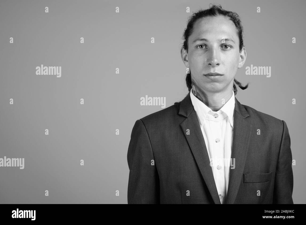 Portrait businessman dreadlocks wearing suit hi-res stock photography ...