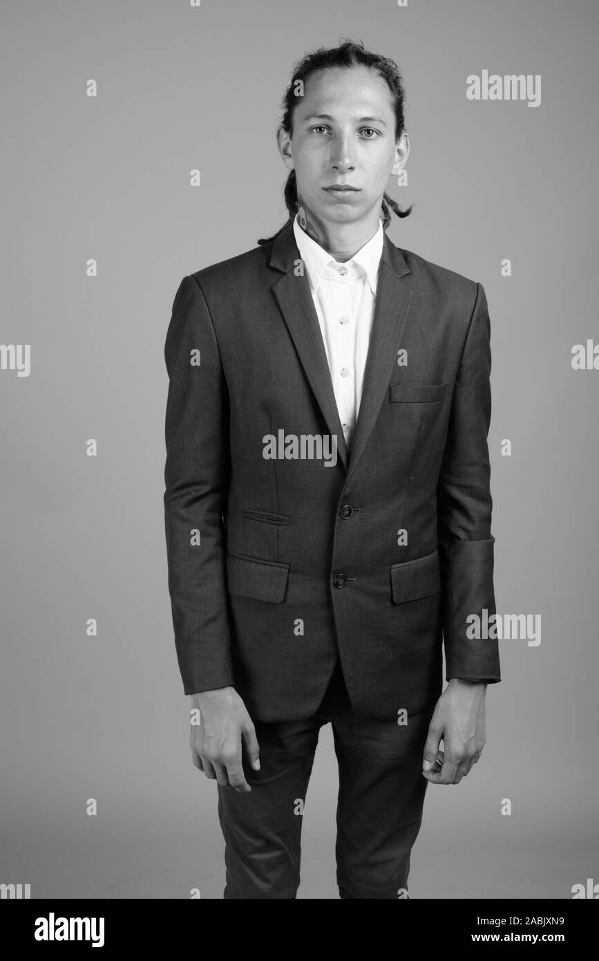 Portrait businessman dreadlocks wearing suit hi-res stock photography ...