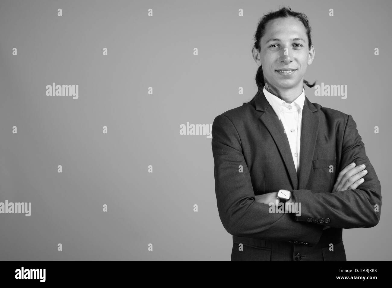 Young businessman with dreadlocks wearing suit in black and white Stock ...