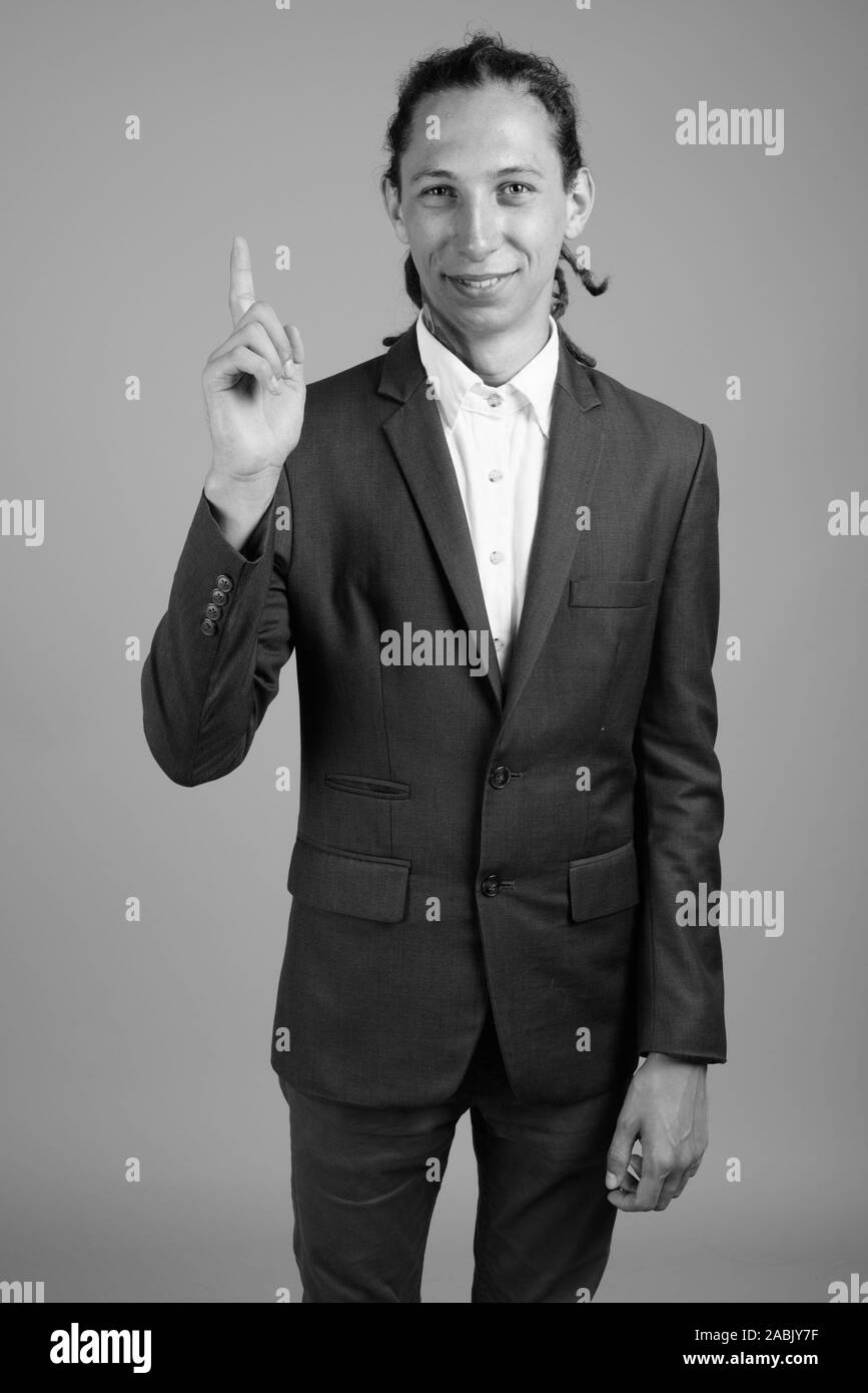 Portrait businessman dreadlocks wearing suit hi-res stock photography ...