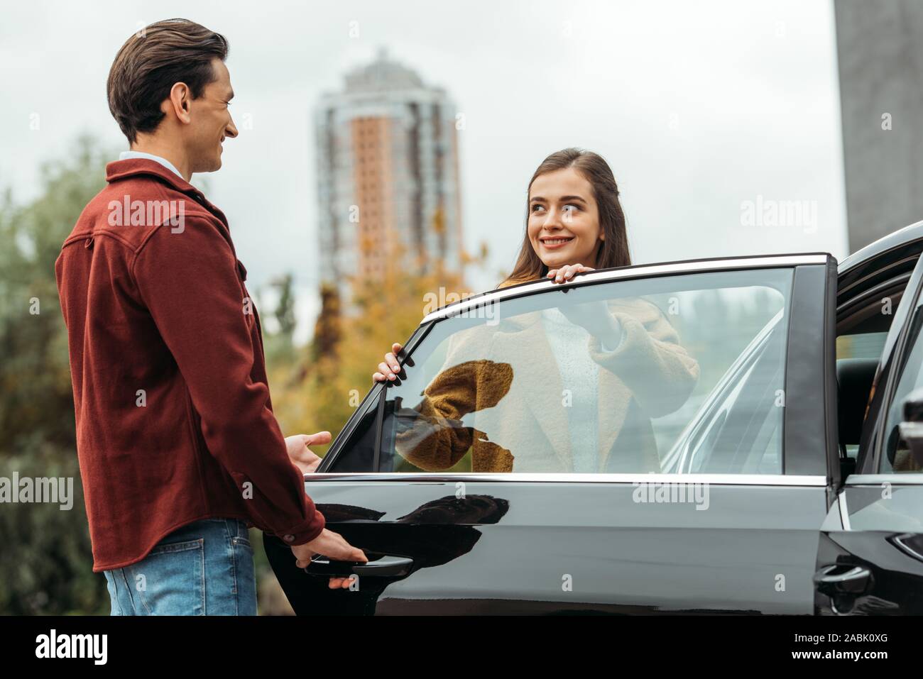 Driver opening car door hi-res stock photography and images - Alamy