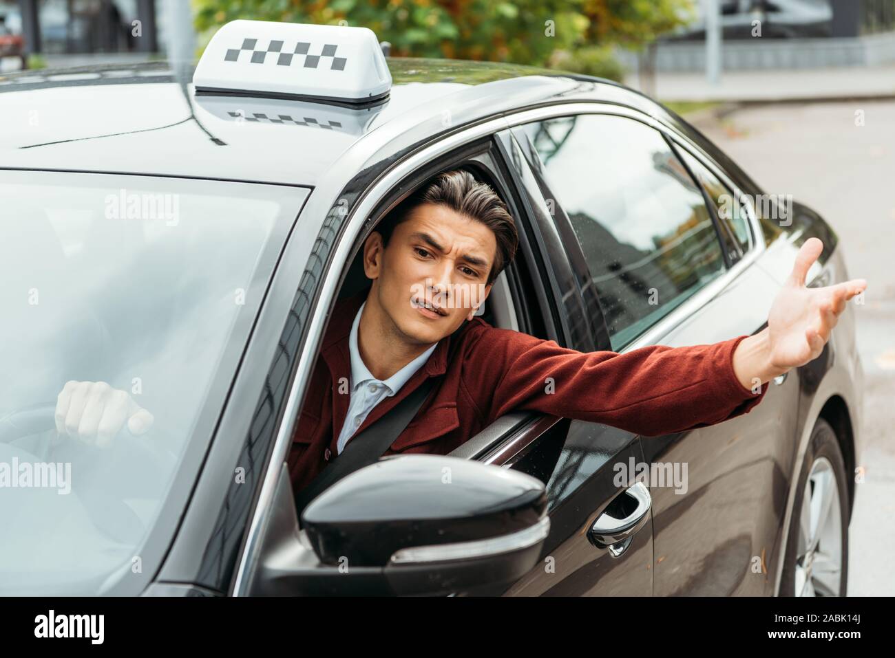 Man leaning out of car window hi-res stock photography and images - Alamy