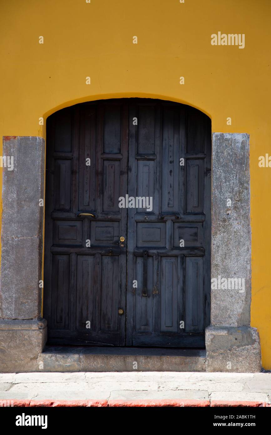 old doors with colorful walls Stock Photo - Alamy