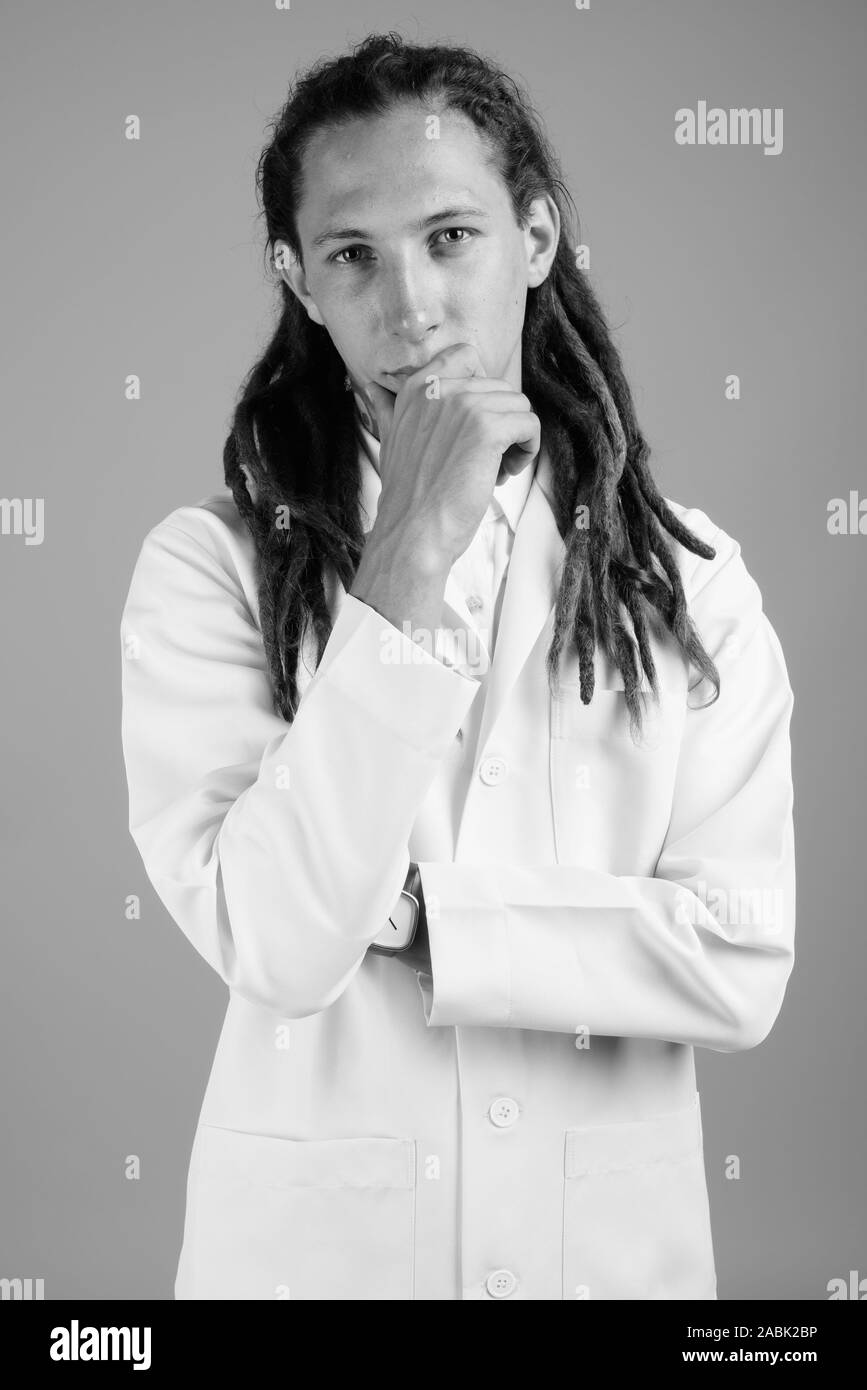 Young man doctor dreadlocks hi-res stock photography and images - Alamy