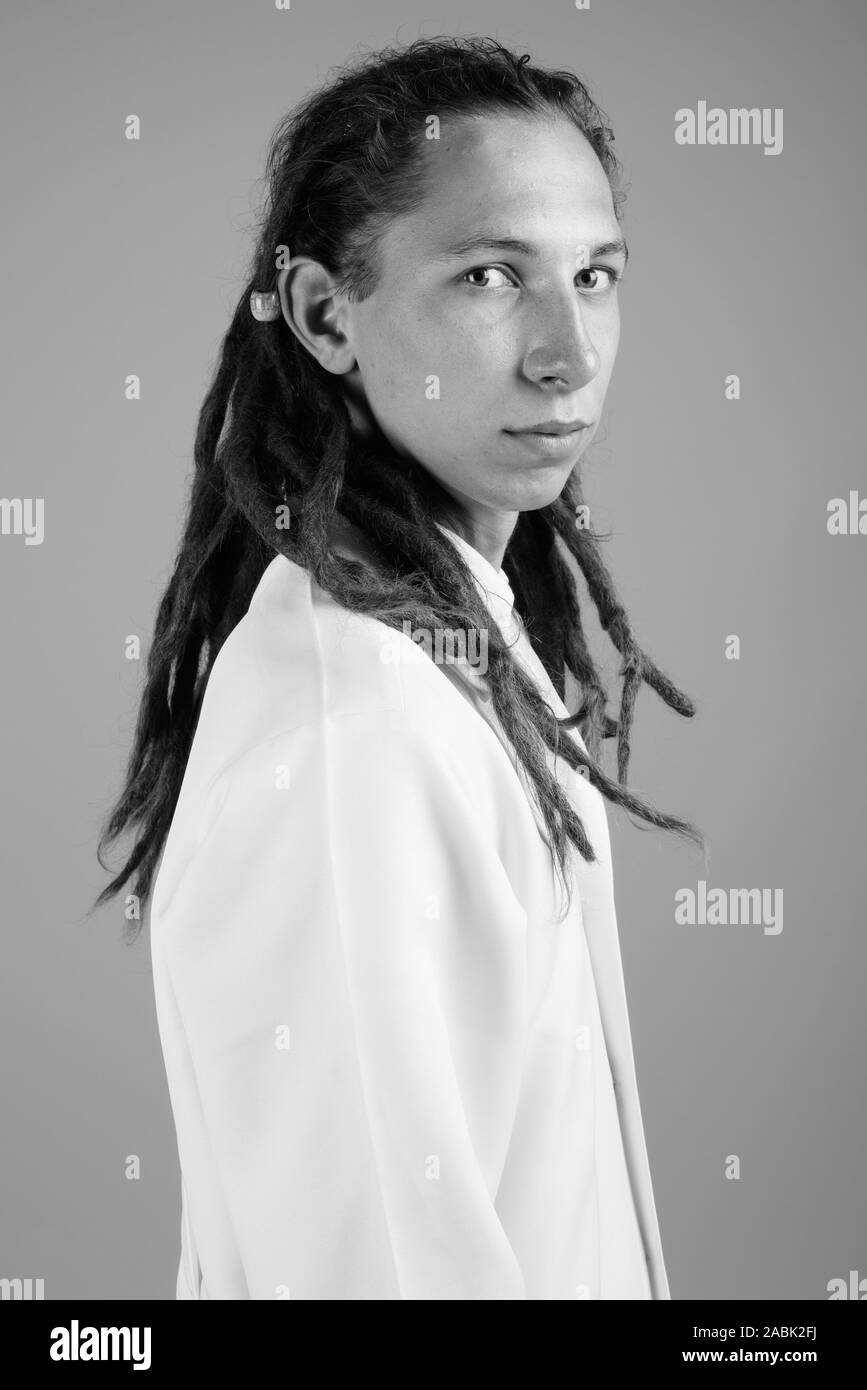 Young man doctor with dreadlocks in black and white Stock Photo - Alamy