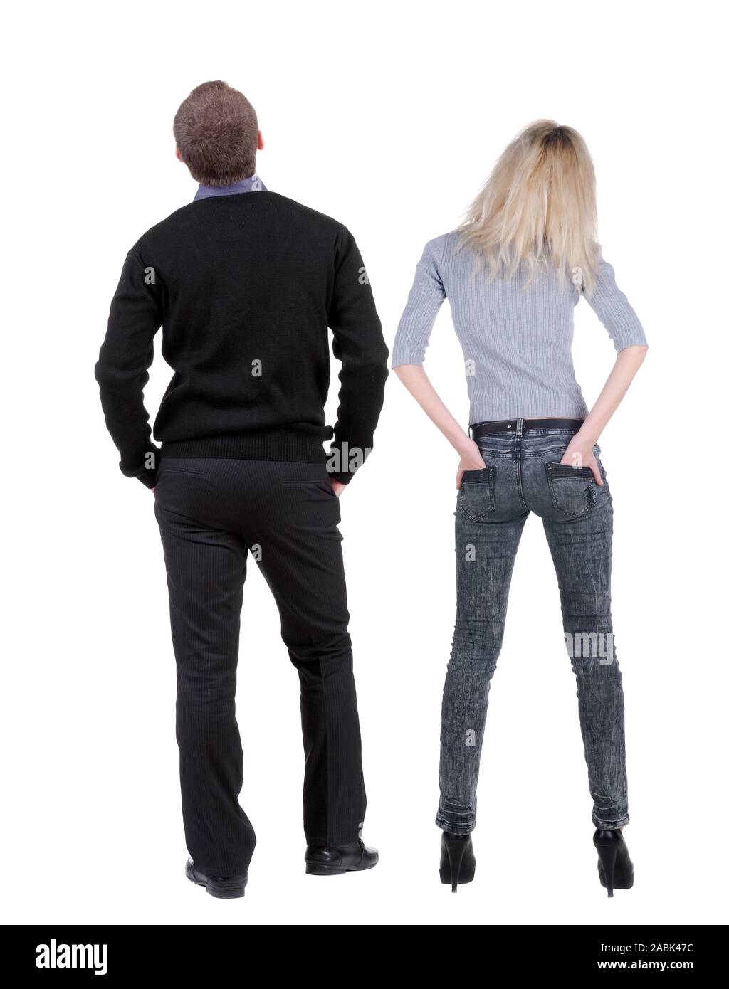 Back view of couple. beautiful friendly girl and guy together. Rear ...