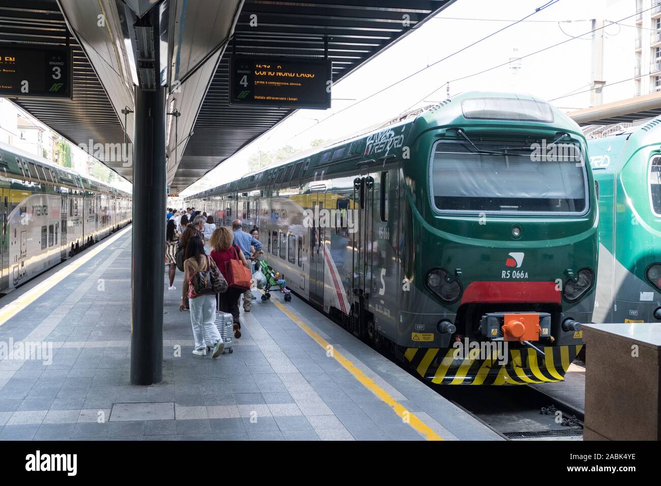 Italy, Milan: Trenord train along the platform in the station of Milan ...
