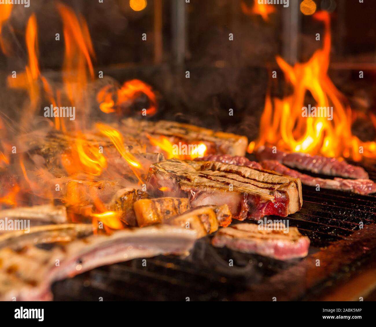 raw meat cooked on grill 2 Stock Photo - Alamy