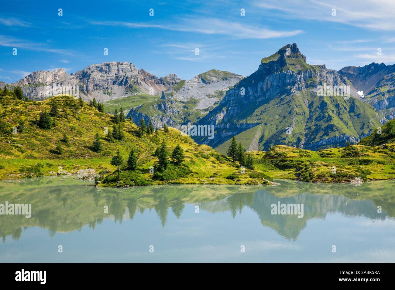 The mountain Hahnen (2606 m) mirrored in the Truebsee. Obwalden ...