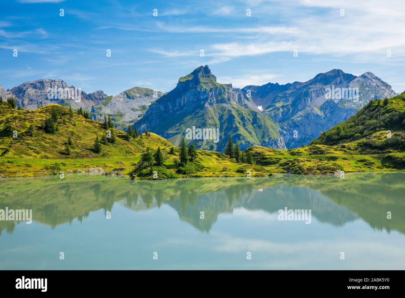 The mountain Hahnen (2606 m) mirrored in the Truebsee. Obwalden ...