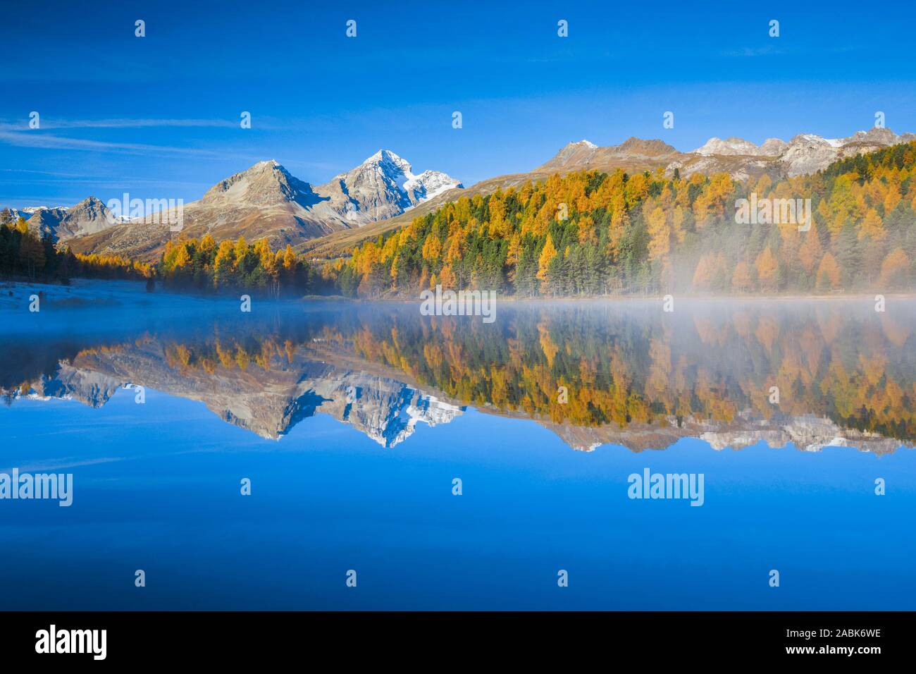 The Piz Albaba and the Piz Julier mirrored in the Lake of Staz (Lej da ...
