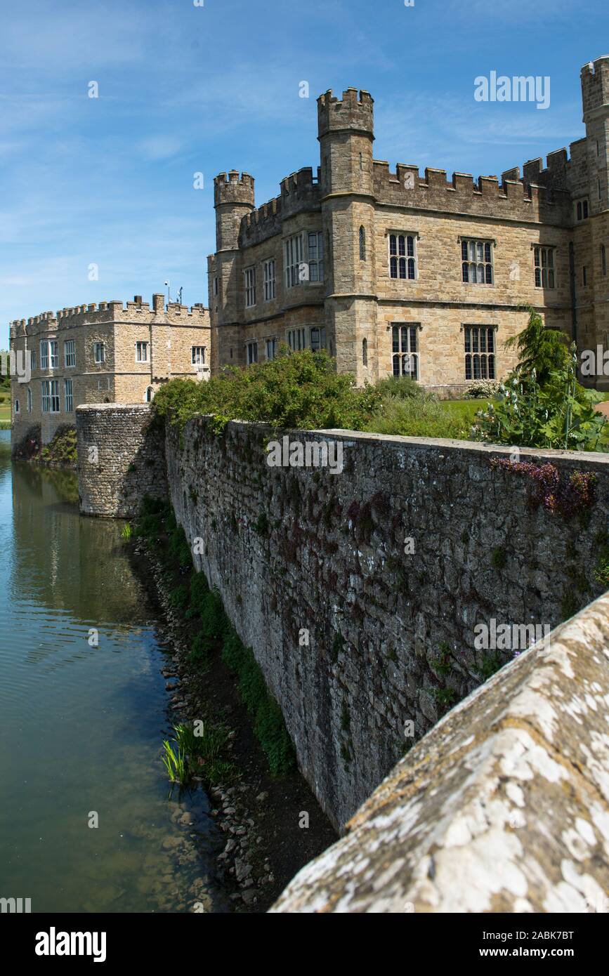Leeds Castle and moat lake and reflections. Curtain wall. Revetment ...