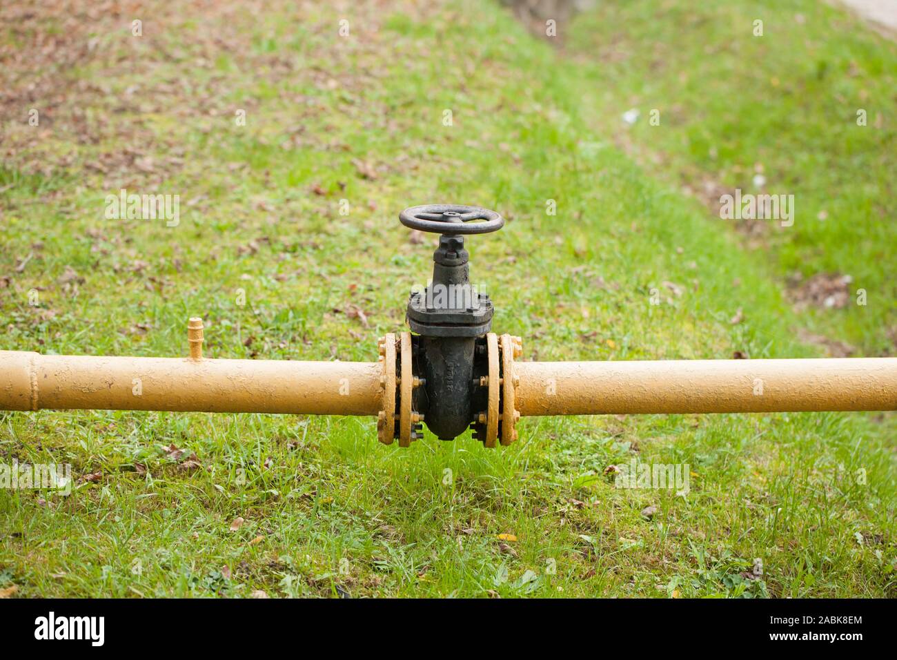 The gas pipeline runs on the street. There is a gate valve on the gas ...