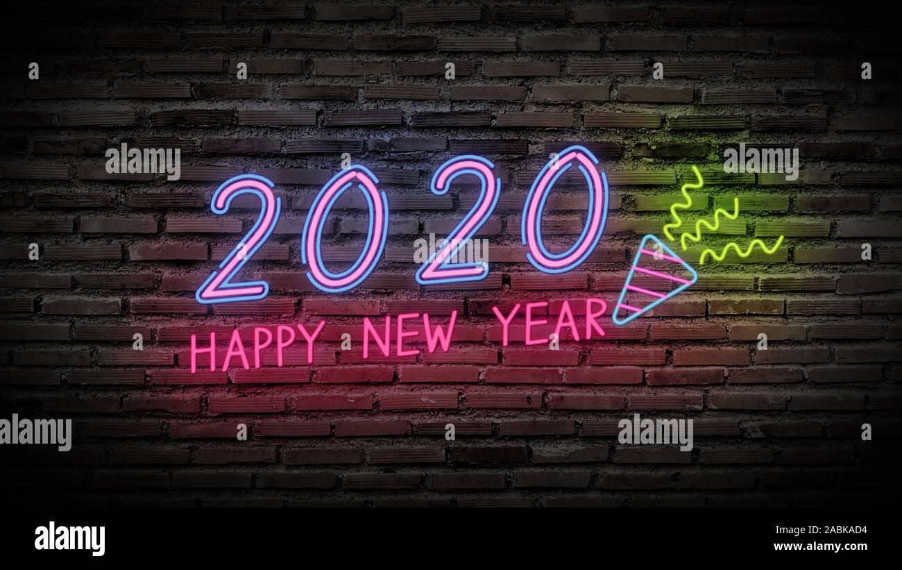 Happy new year shiny neon fluorescence lamps sign glow on black brick ...