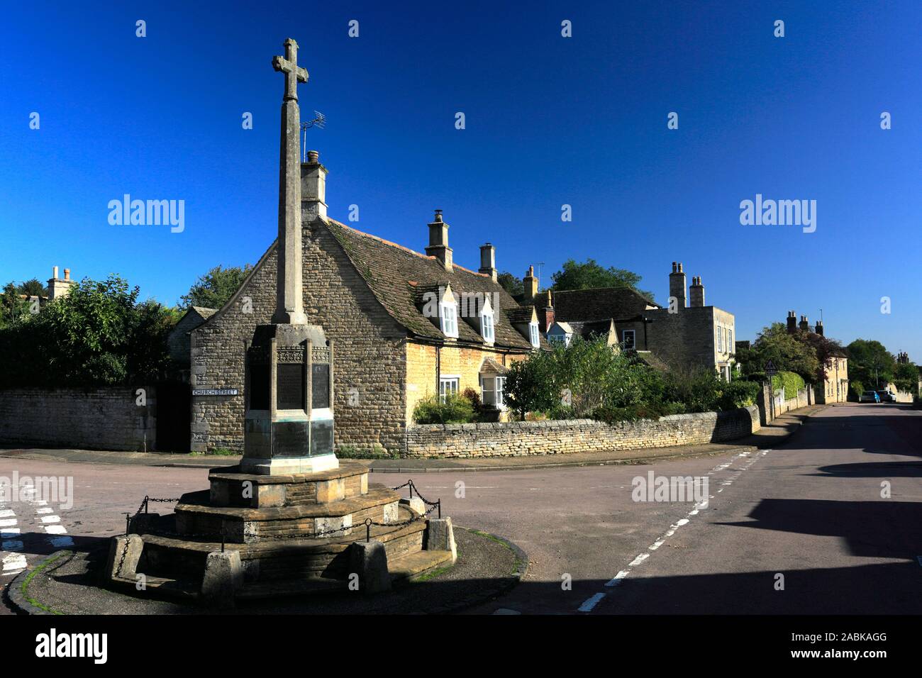 The War memorial and street view, Easton on the Hill village ...