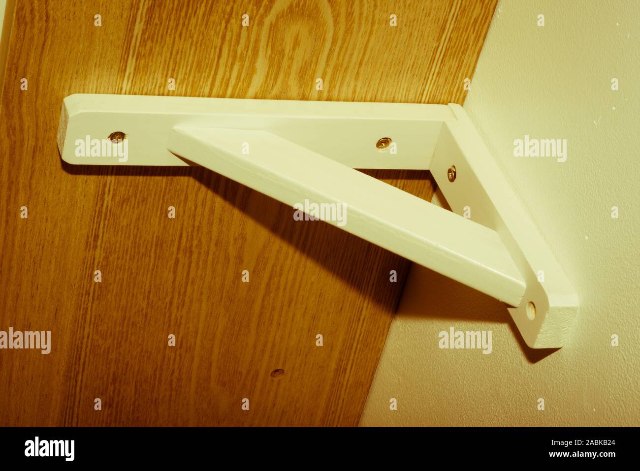 Wall wooden shelf support brackets Stock Photo - Alamy