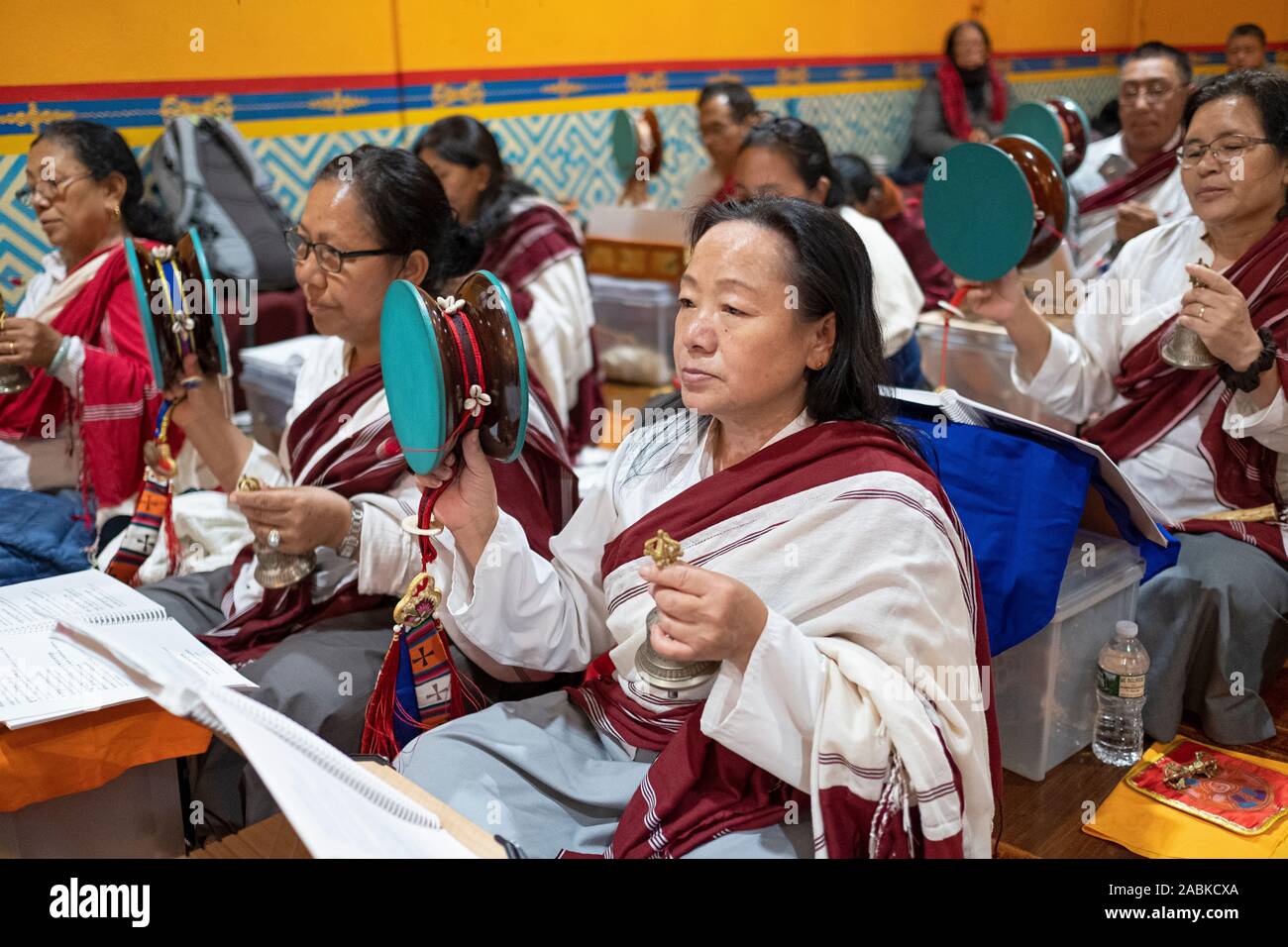 Devout Buddhist worshippesr pray & meditate at a monthly Throma Puja at ...