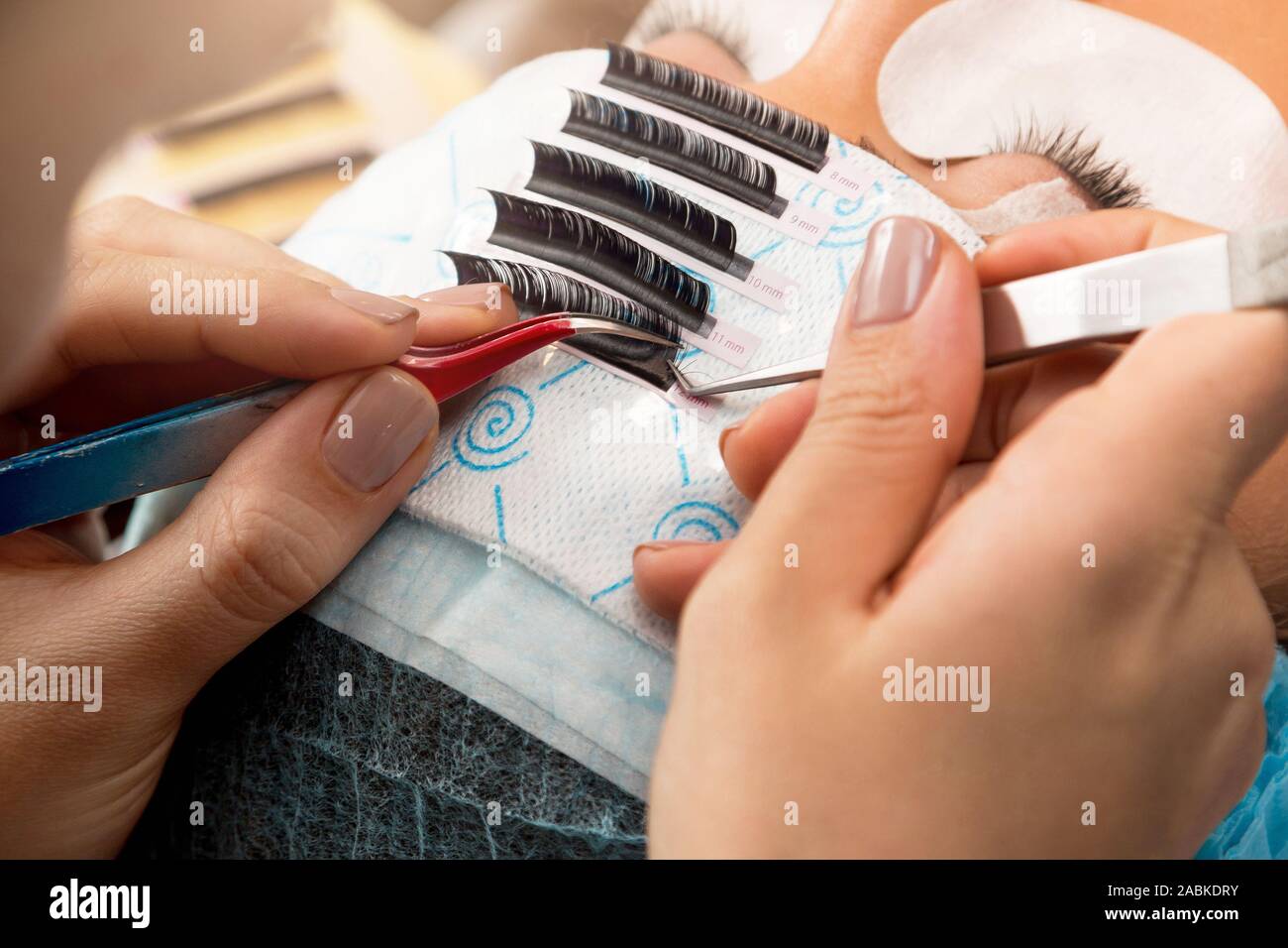 Procedure of eyelashes extension in salon Stock Photo - Alamy