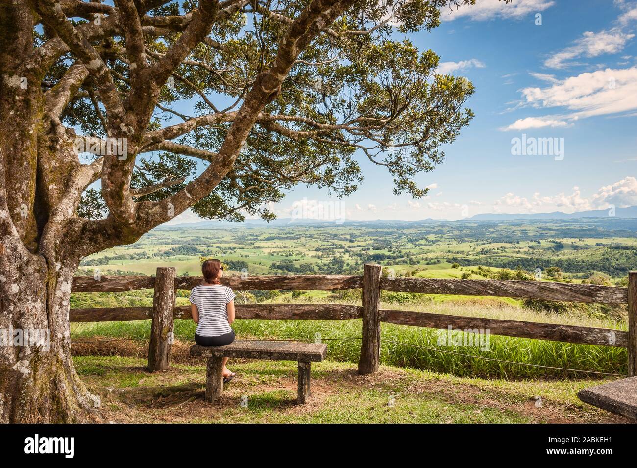Milla Milla Lookout with green, rolling hills, rustic hand hewn fence ...