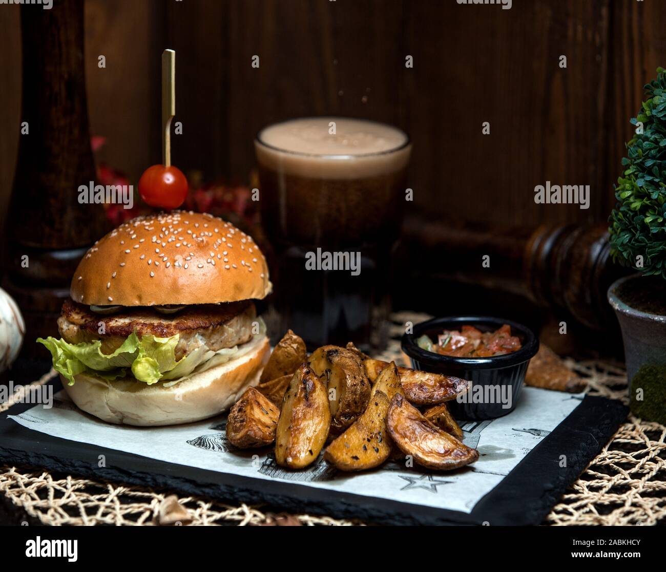 chicken burger with side homemade fried potato Stock Photo - Alamy