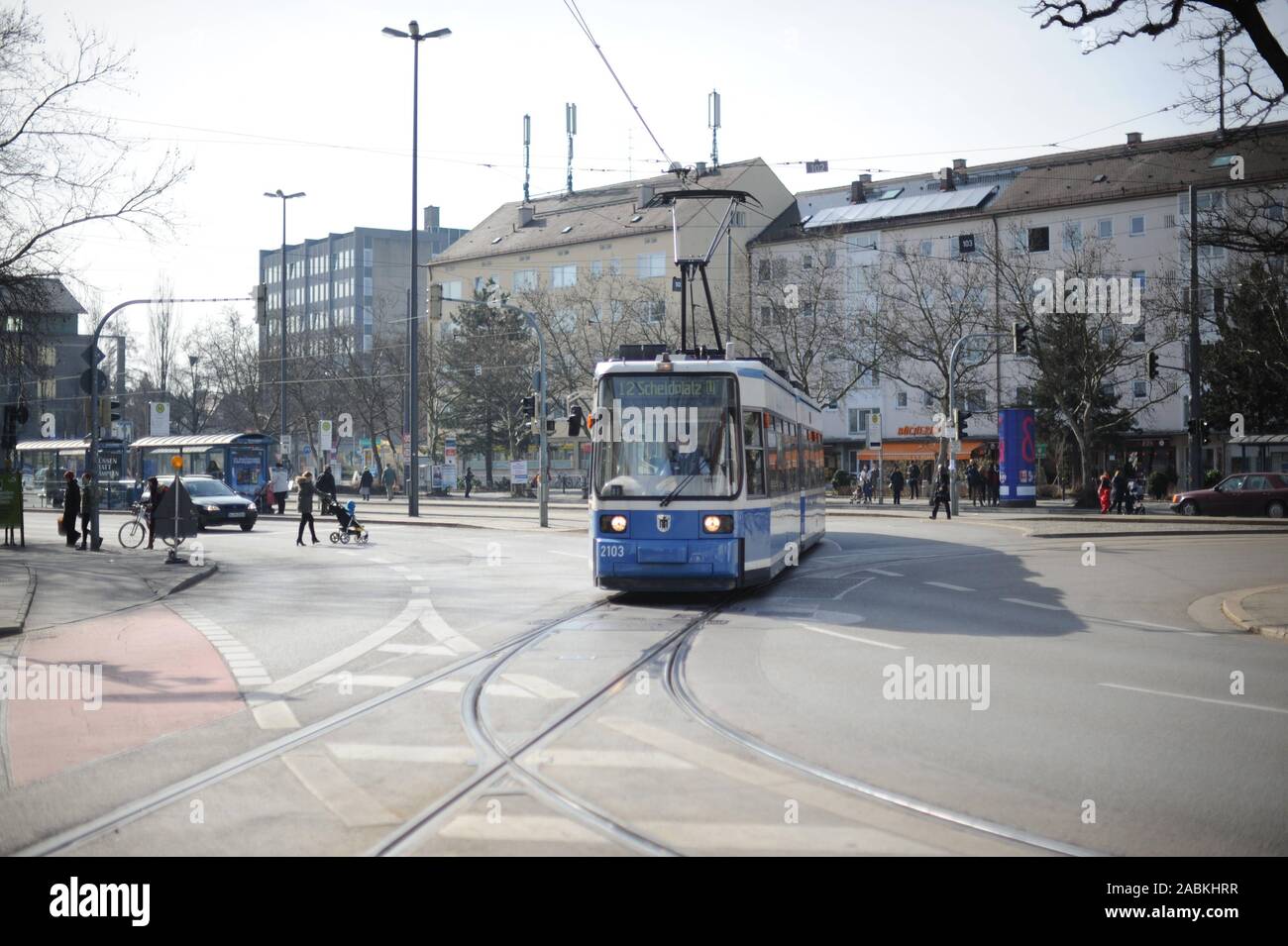 A tram line 12 leaves the stop "Romanplatz" in Nymphenburg. [automated ...