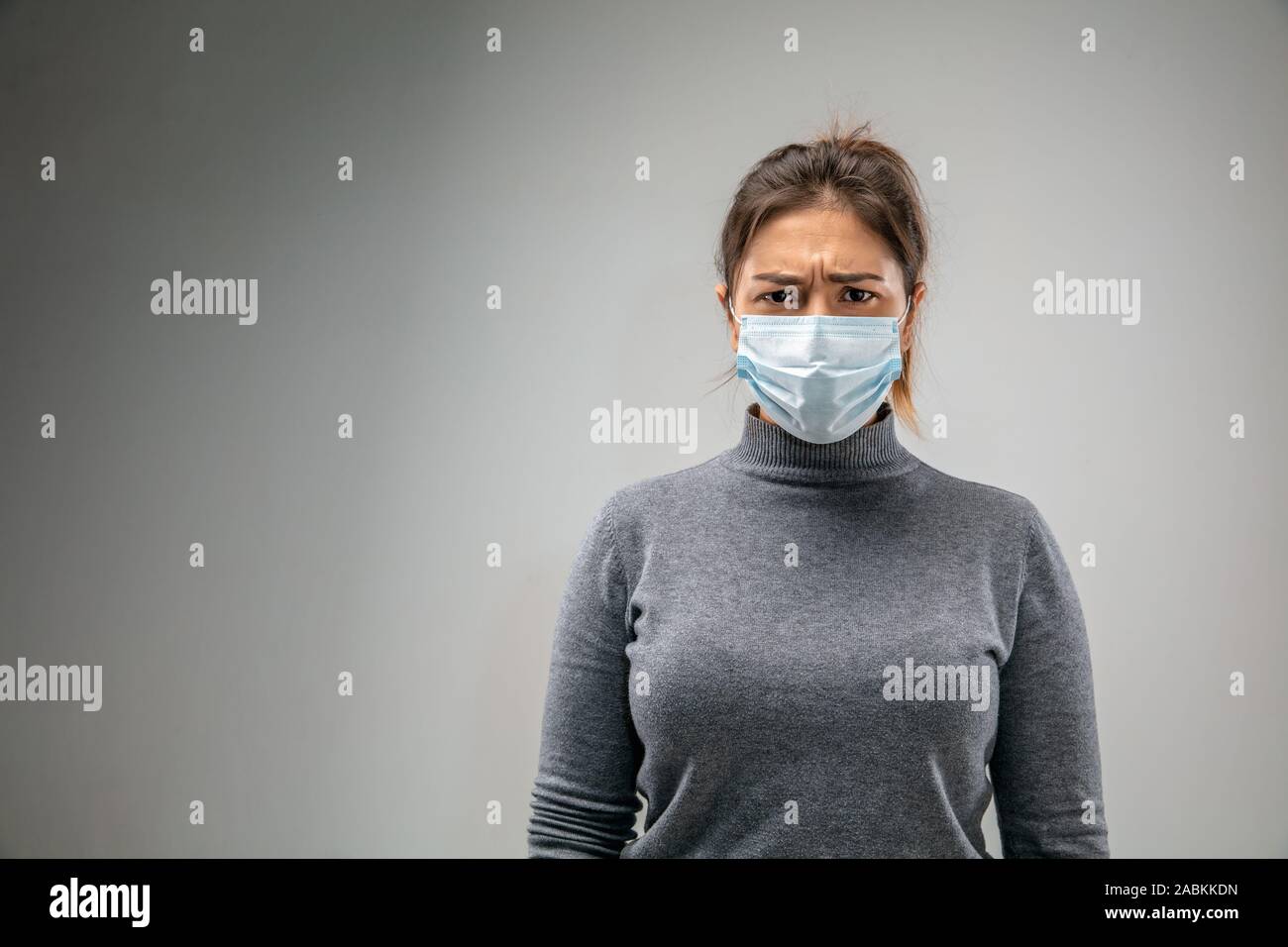 Can't breathe. Caucasian woman wearing the respiratory protection mask ...