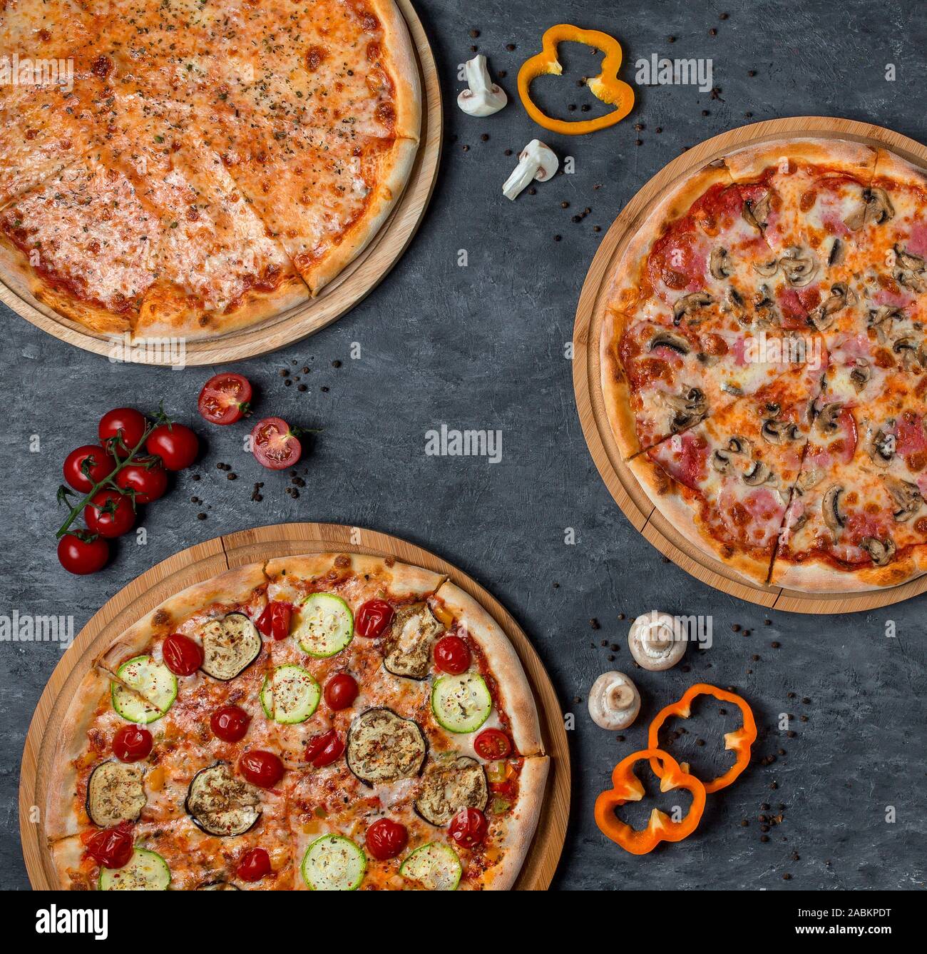 different types of pizza on the table Stock Photo - Alamy