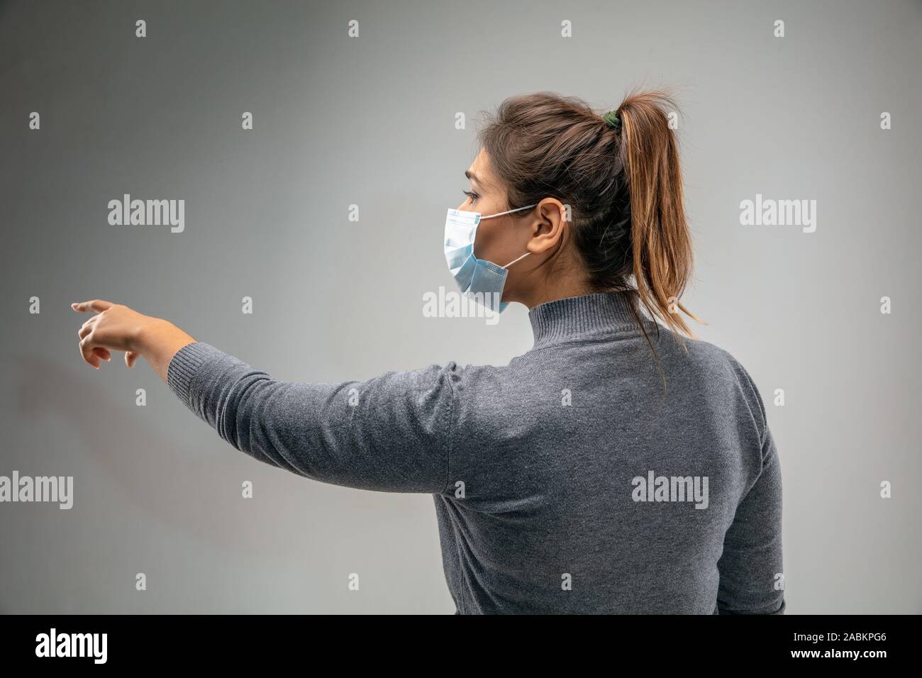 Can't breathe. Caucasian woman wearing the respiratory protection mask ...